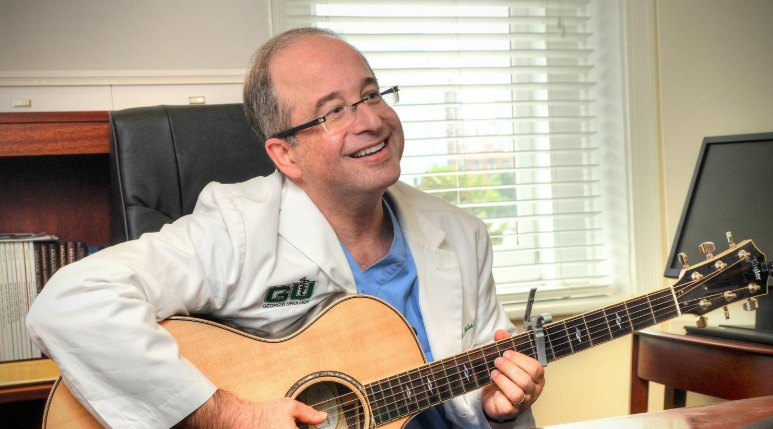 Surgeon uses music, nonprofit in fight against prostate cancer - Scott ...